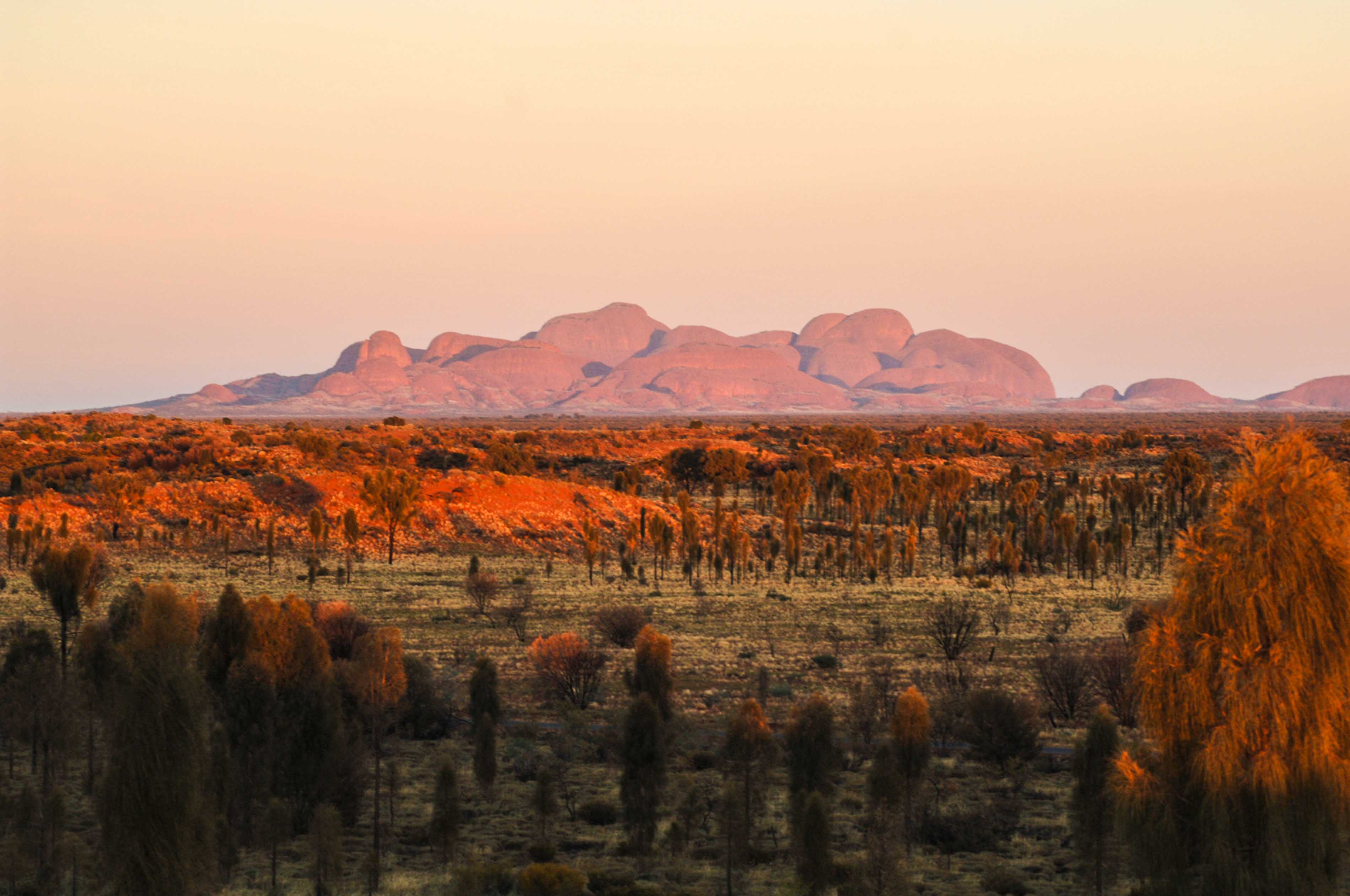 Aboriginal owners ban climbing Australia's iconic red rock Uluru ...